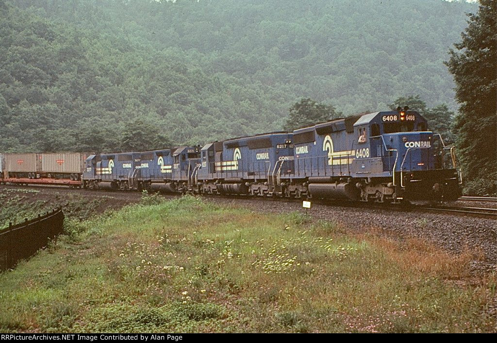 CR SD40-2 6408 and SD45 6217 provide much needed braking assist to a hot TV train